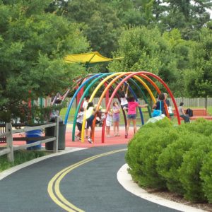 perimeter path and rainbow climber | Accessible Playgrounds
