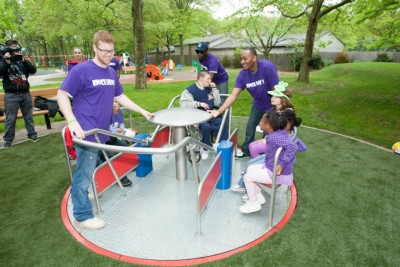 merry go round in use | Accessible Playgrounds